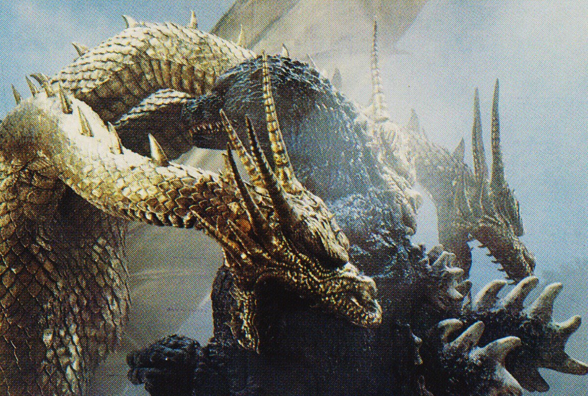 Image - GVKG - King Ghidorah Bites Godzilla.jpg | Gojipedia | FANDOM ... Image - GVKG - King Ghidorah Bites Godzilla.jpg | Gojipedia | FANDOM ...